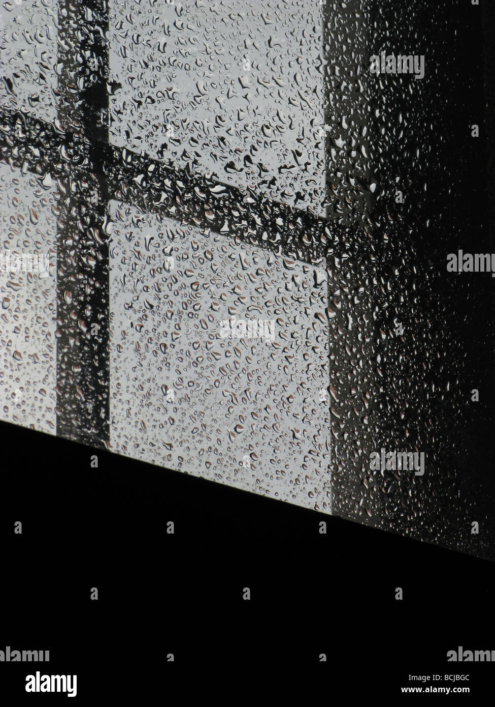 rain drops covered window seen from inside dark room Stock Photo - Alamy