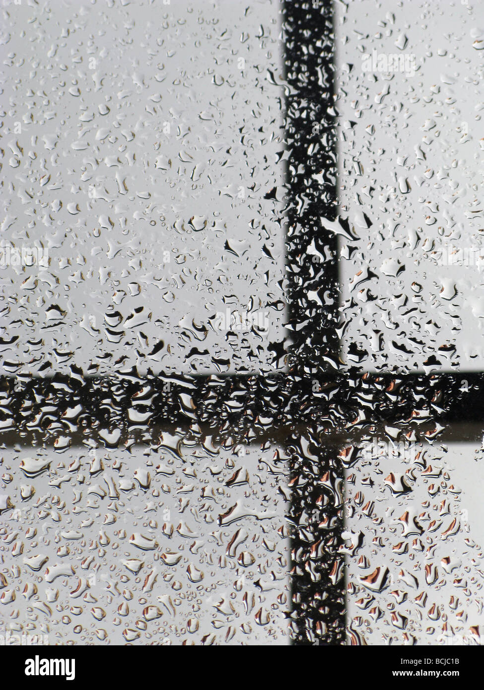 rain drops covered window seen from inside dark room Stock Photo - Alamy