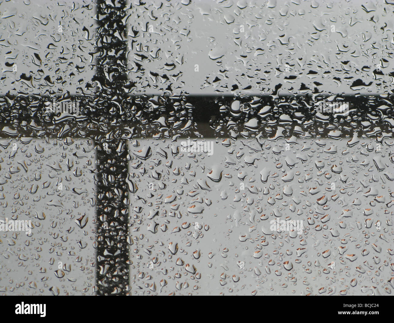 rain drops covered window seen from inside dark room Stock Photo - Alamy