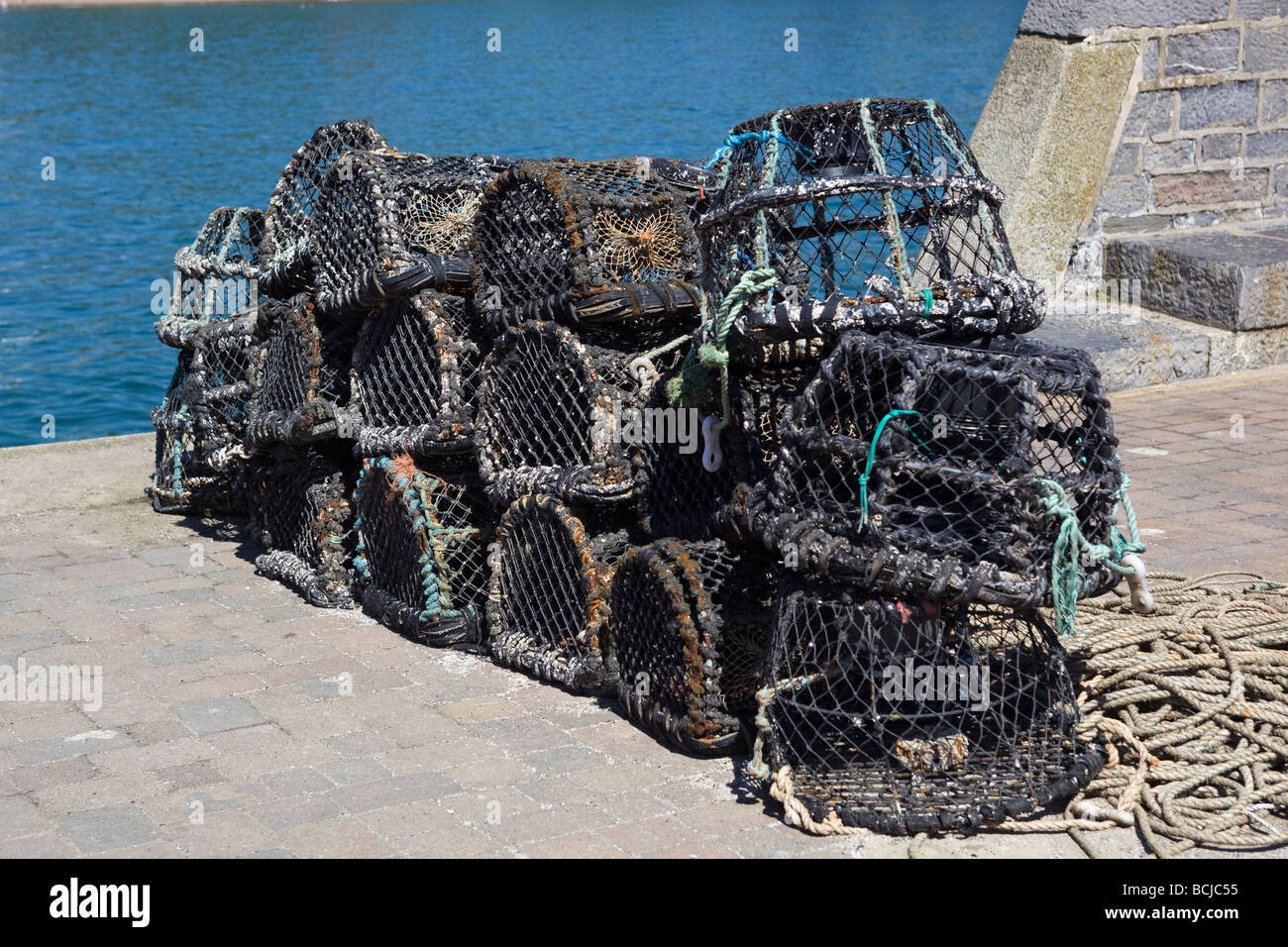 Lobster or Fishing Pots Quayside Tenby South Wales Stock Photo - Alamy
