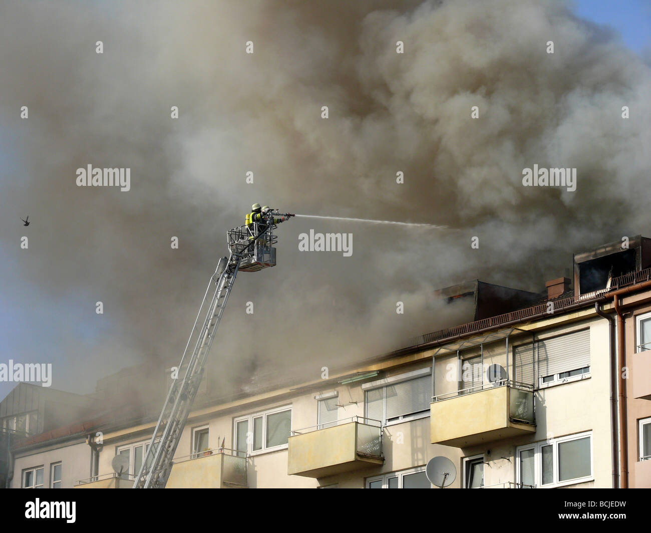 Firefighter roof hi-res stock photography and images - Alamy
