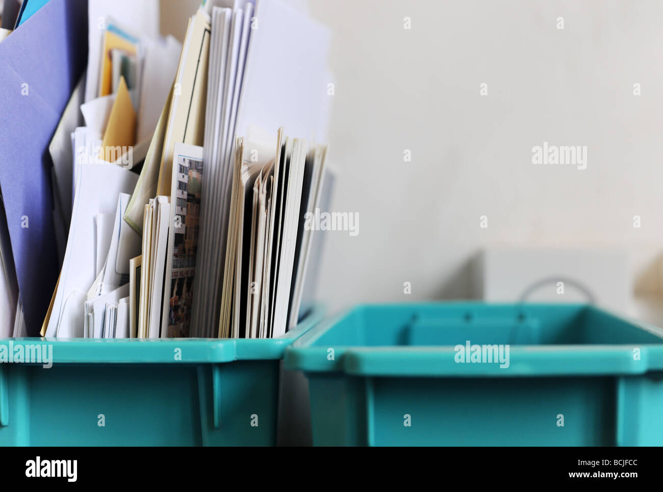 books and papers in filling bin Stock Photo - Alamy