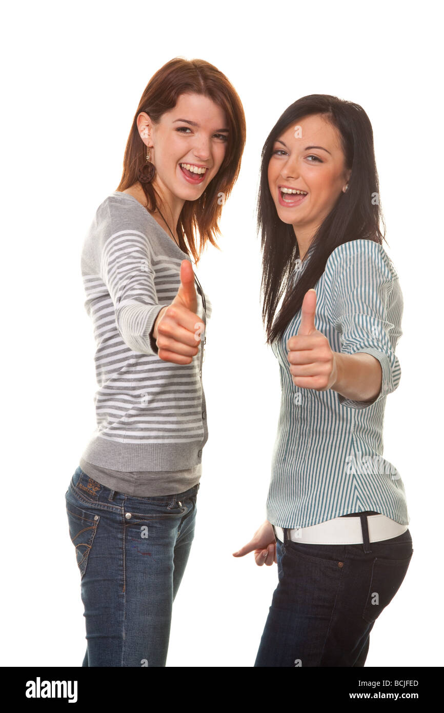 Two young girls handshake and agree Stock Photo - Alamy