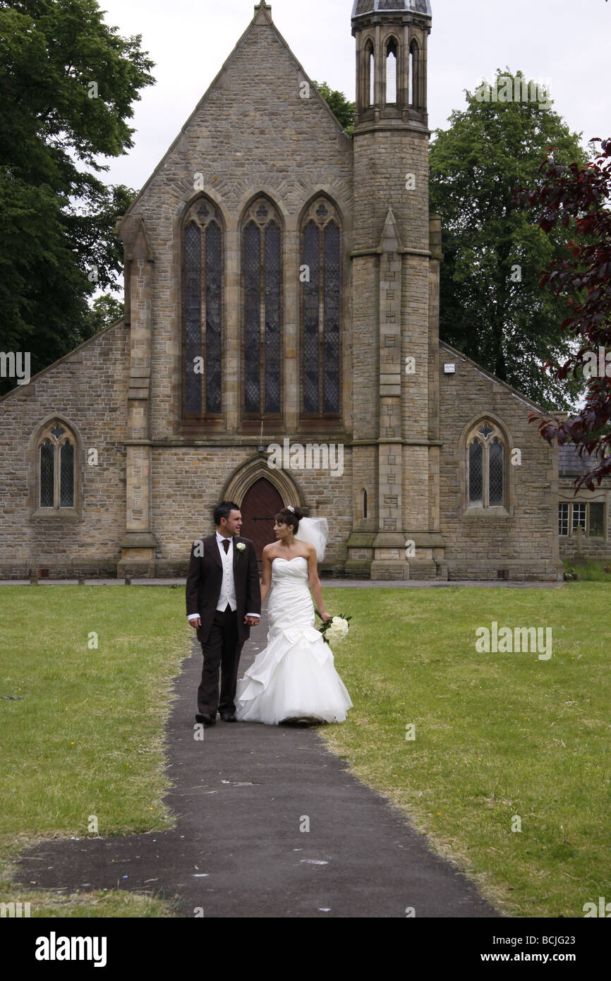 Bride and Groom leaving the Church after their Wedding Stock Photo - Alamy
