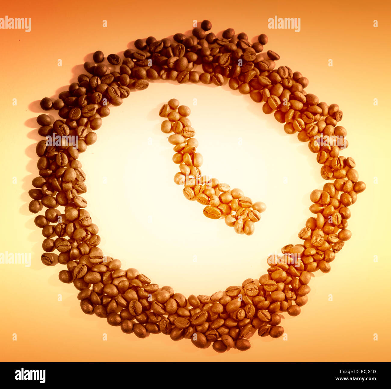 Clock made from coffee beans Stock Photo - Alamy