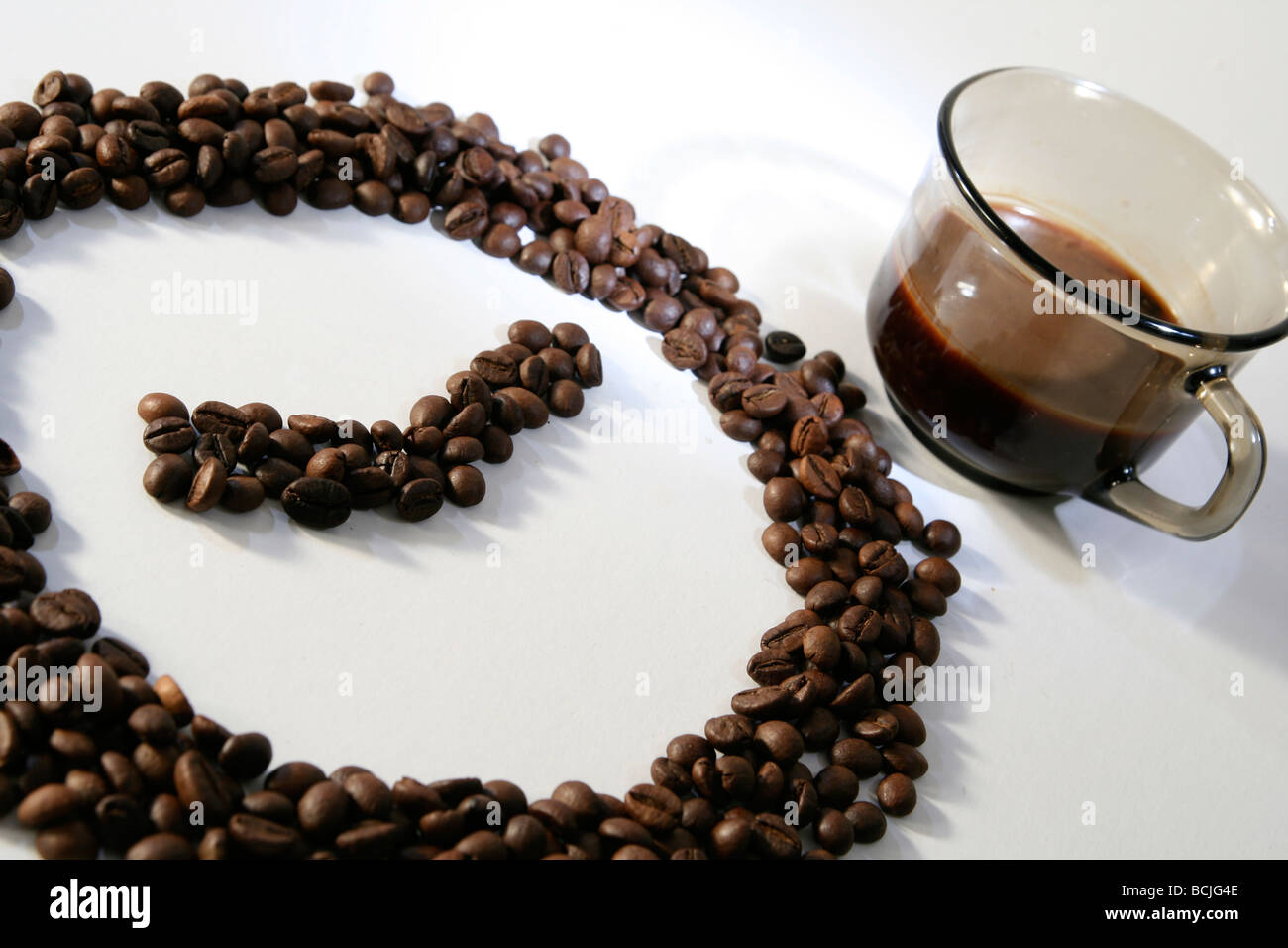 Clock made from coffee beans Stock Photo - Alamy