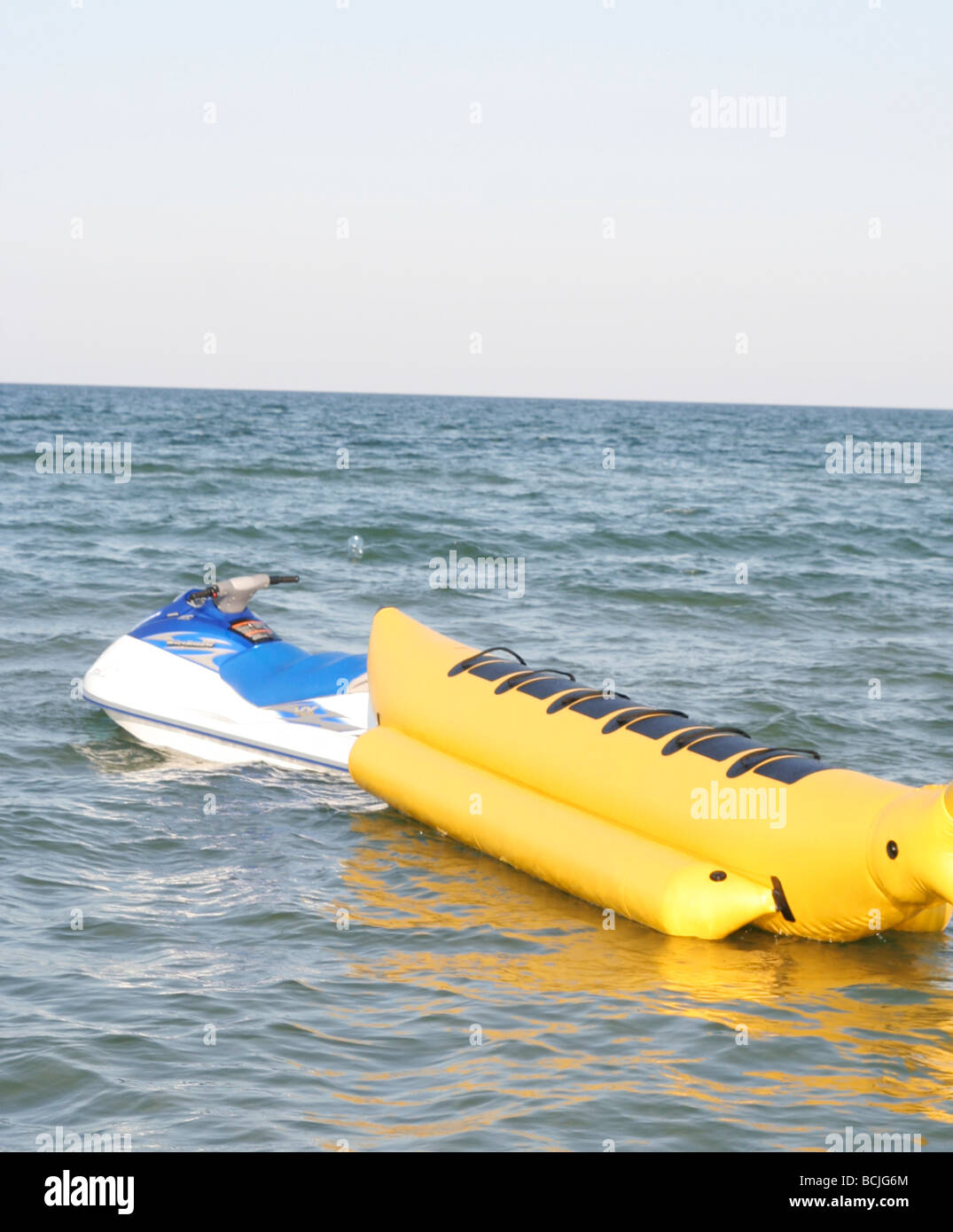 Canoe on an empty beach Stock Photo - Alamy