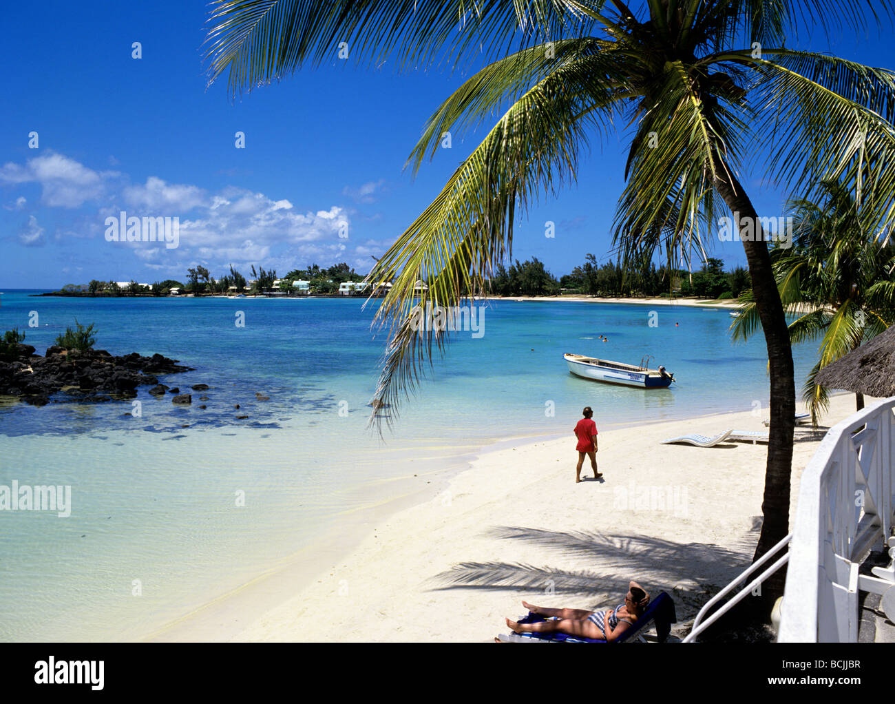 Idyllic Merville Beach on Grand Baie, a popular tourist resort in the ...