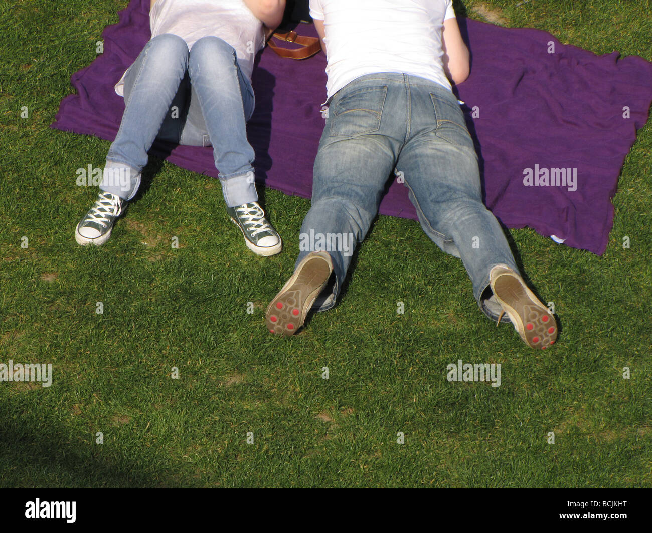 sunbath sunbathing meadow Stock Photo - Alamy