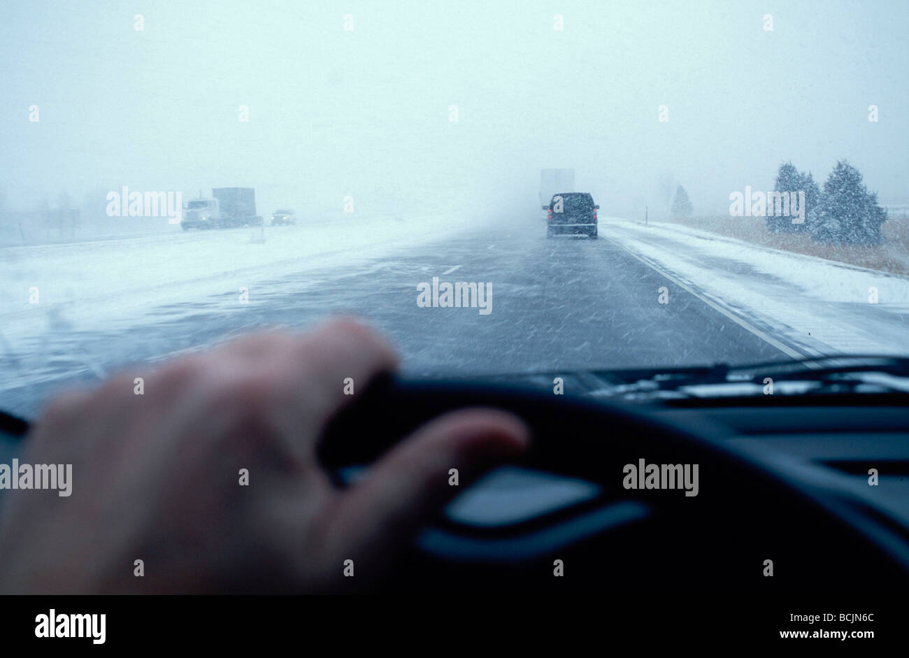 Person Driving in Snowy Weather w/ View from Car AK Stock Photo - Alamy