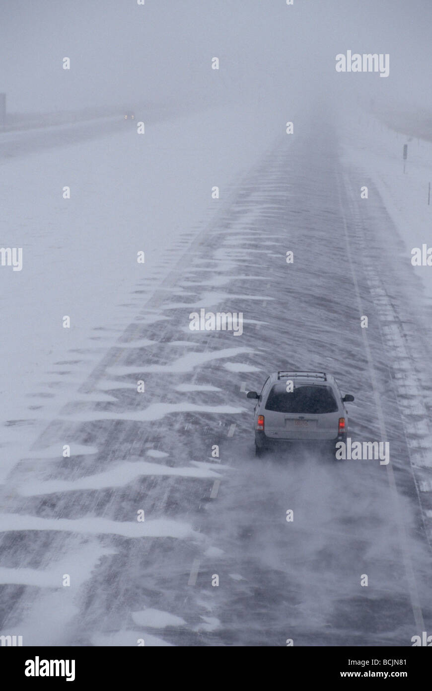Car Driving on Interstate w/ Blowing & Drifting Snow Iowa Stock Photo ...