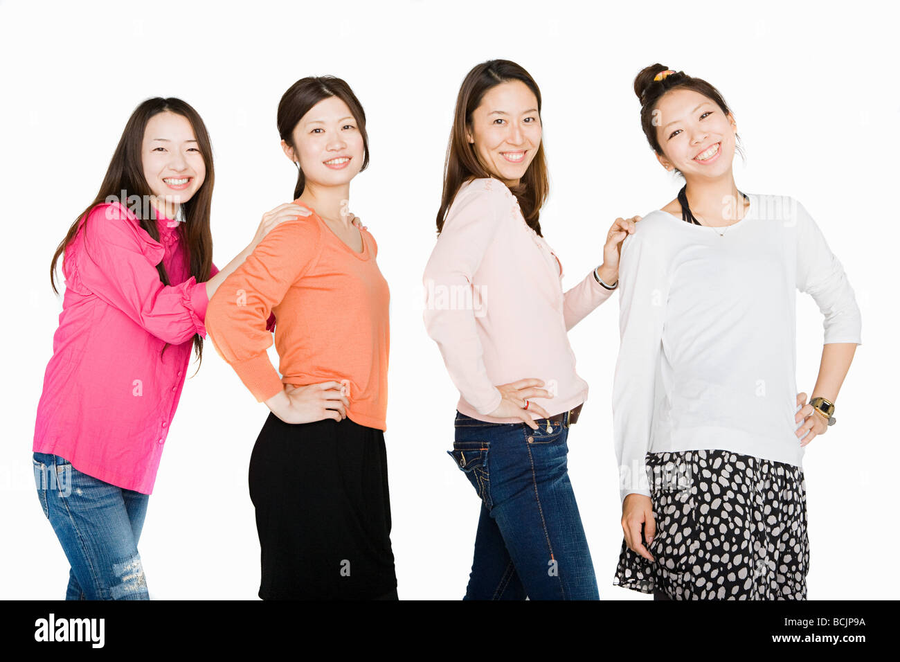 Women in a row Stock Photo - Alamy