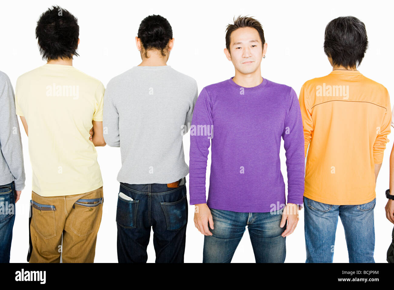 Man in a row Stock Photo - Alamy