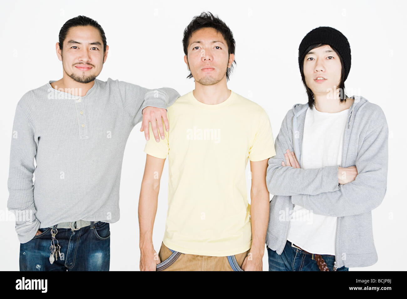 Stand three men hi-res stock photography and images - Alamy