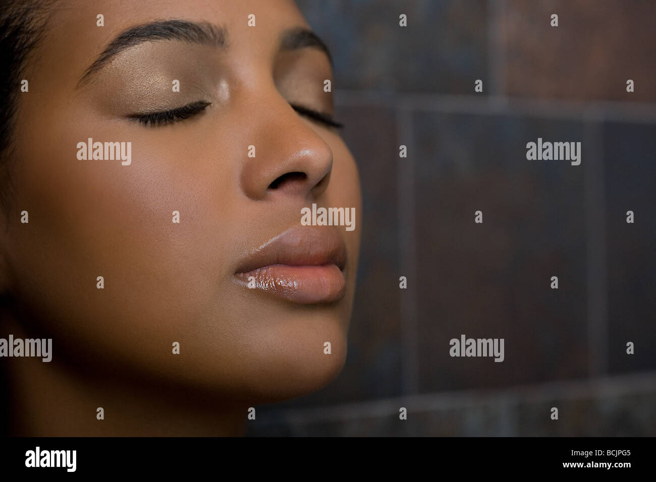 Woman with eyes closed Stock Photo - Alamy