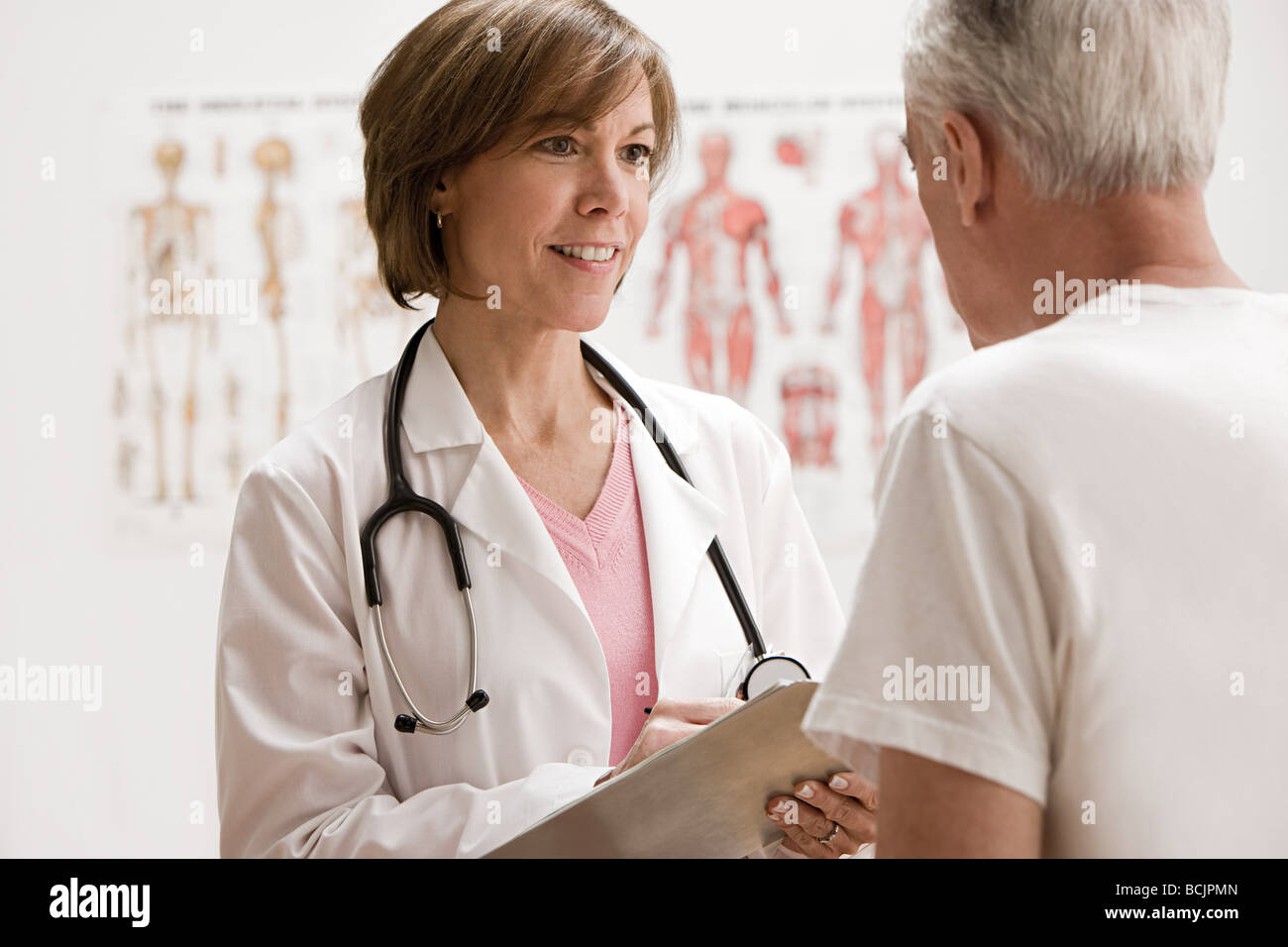 Doctor and patient Stock Photo - Alamy