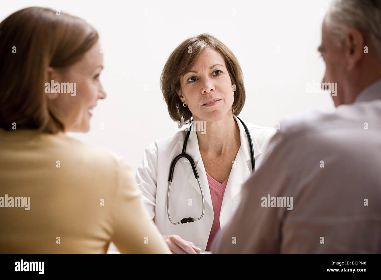 Doctor and patients Stock Photo - Alamy