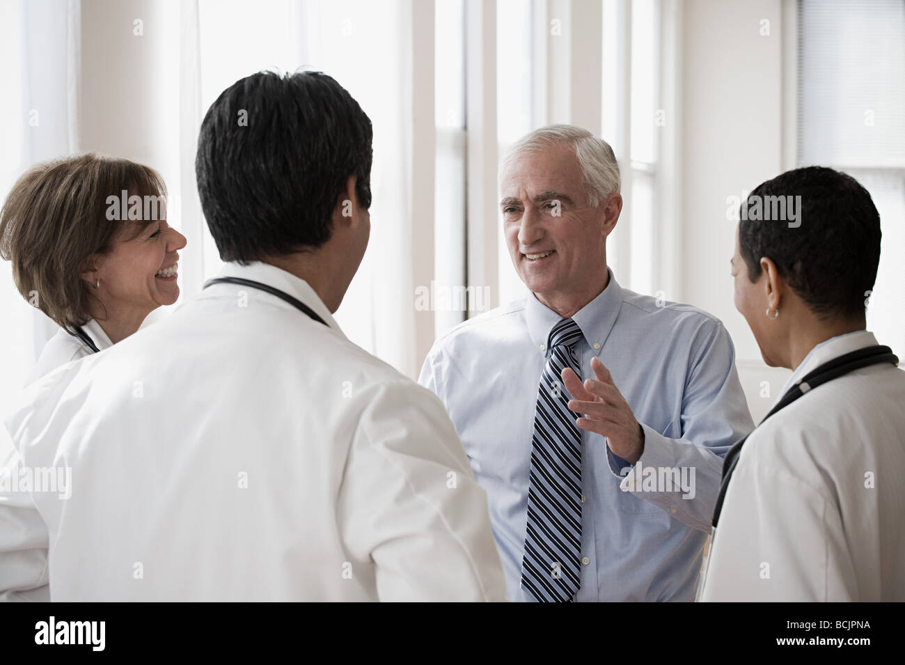 Doctors having discussion Stock Photo - Alamy