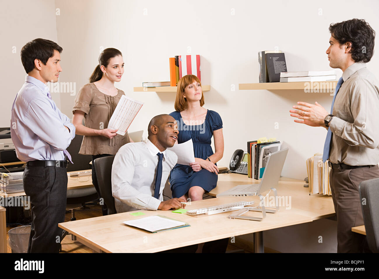 Five office workers in a meeting Stock Photo - Alamy