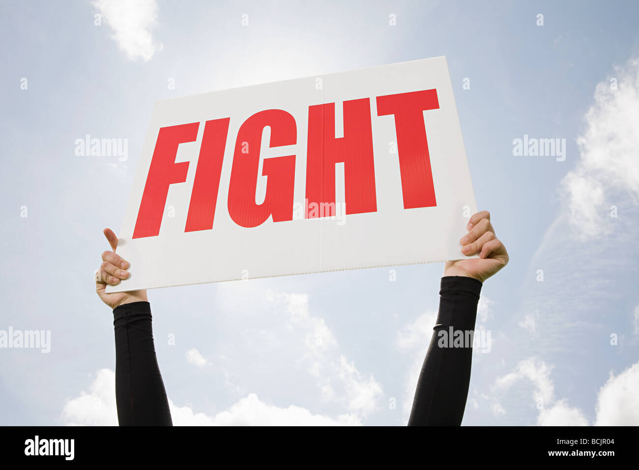Cheerleader with fight sign Stock Photo - Alamy