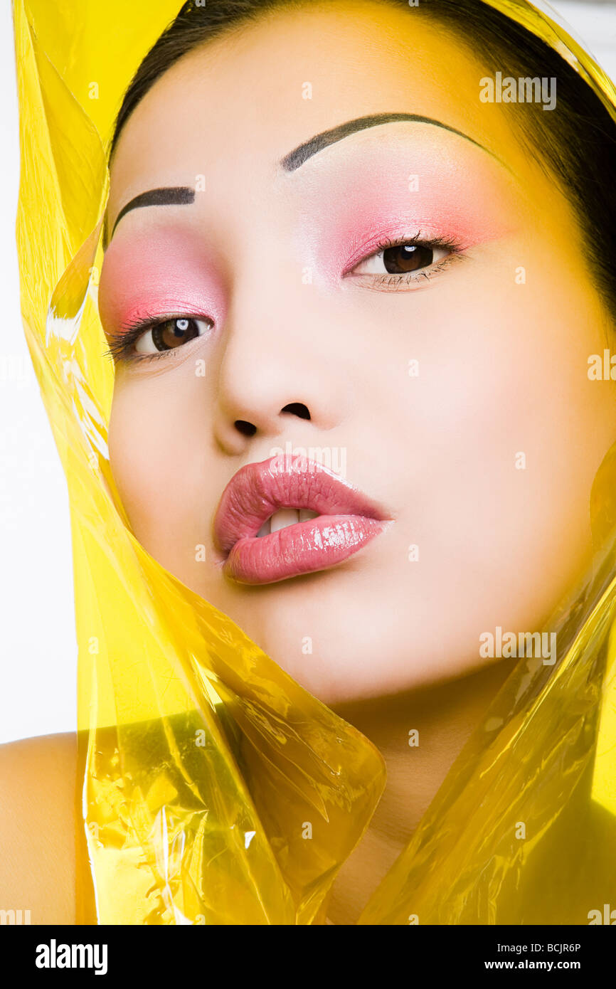 Young woman with plastic around her head Stock Photo - Alamy