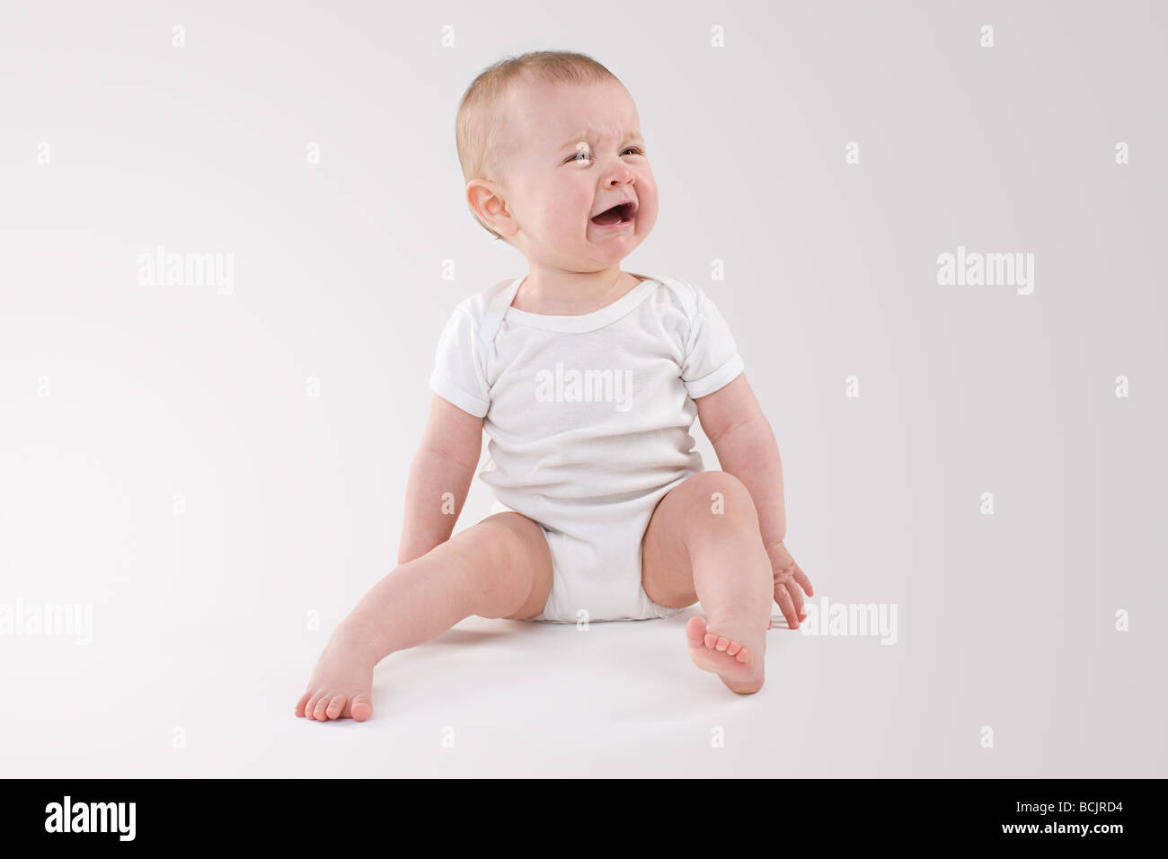 Crying baby white background hi-res stock photography and images - Alamy