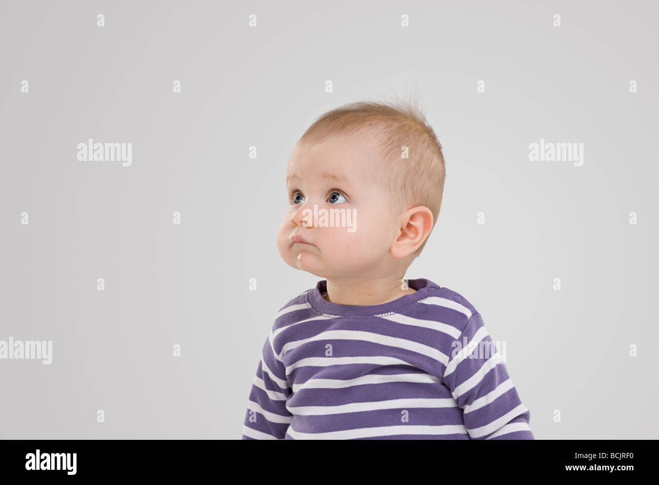 Baby looking up Stock Photo - Alamy