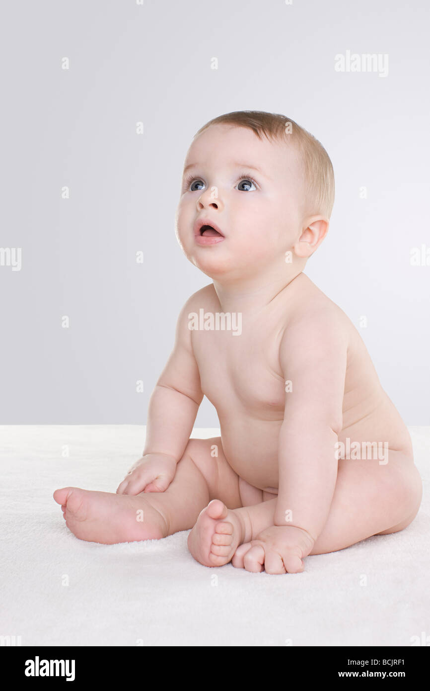 Baby looking up Stock Photo - Alamy