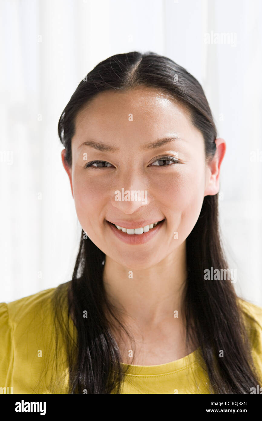 Portrait of a smiling japanese woman Stock Photo - Alamy