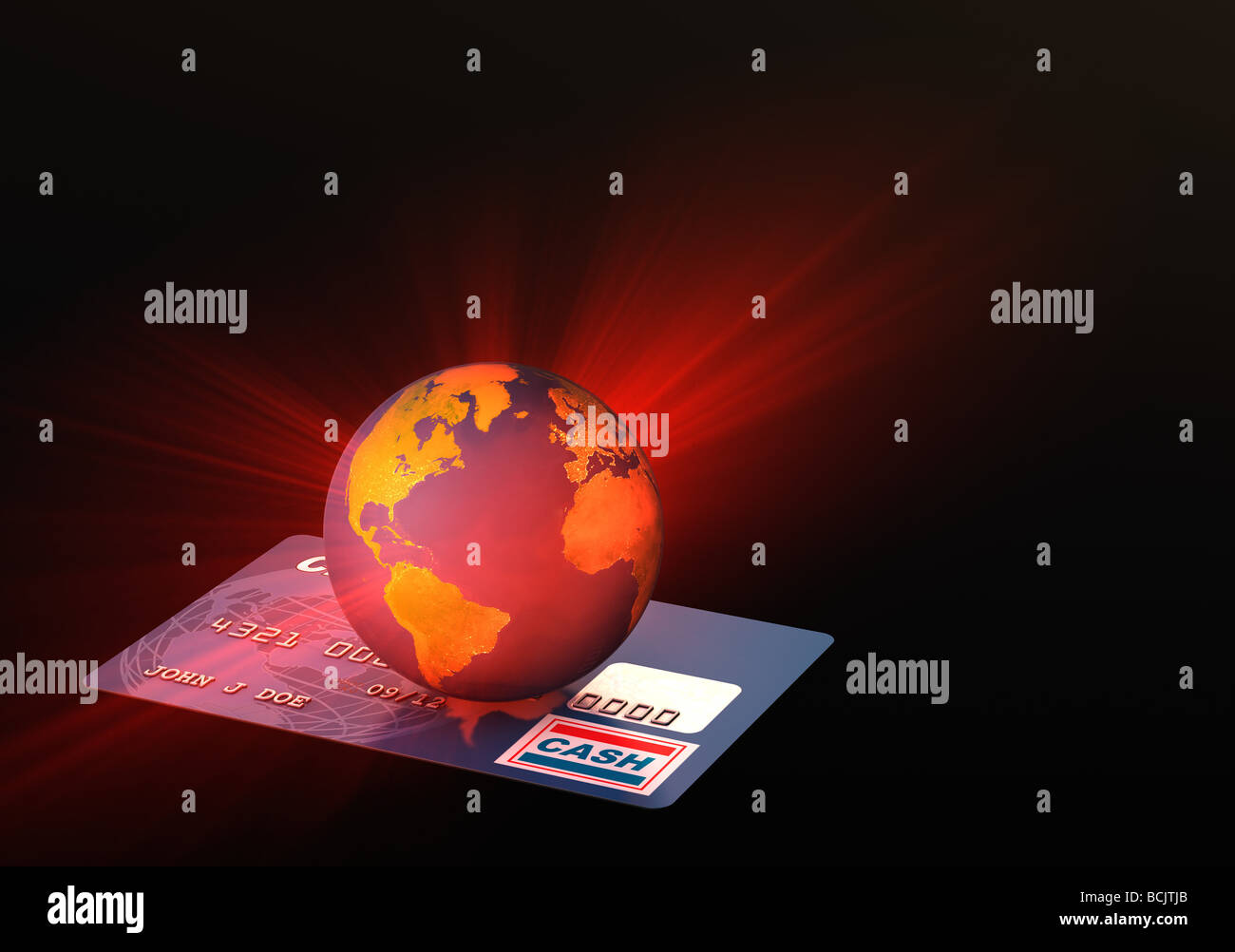 Light coming from globe on credit card Stock Photo - Alamy