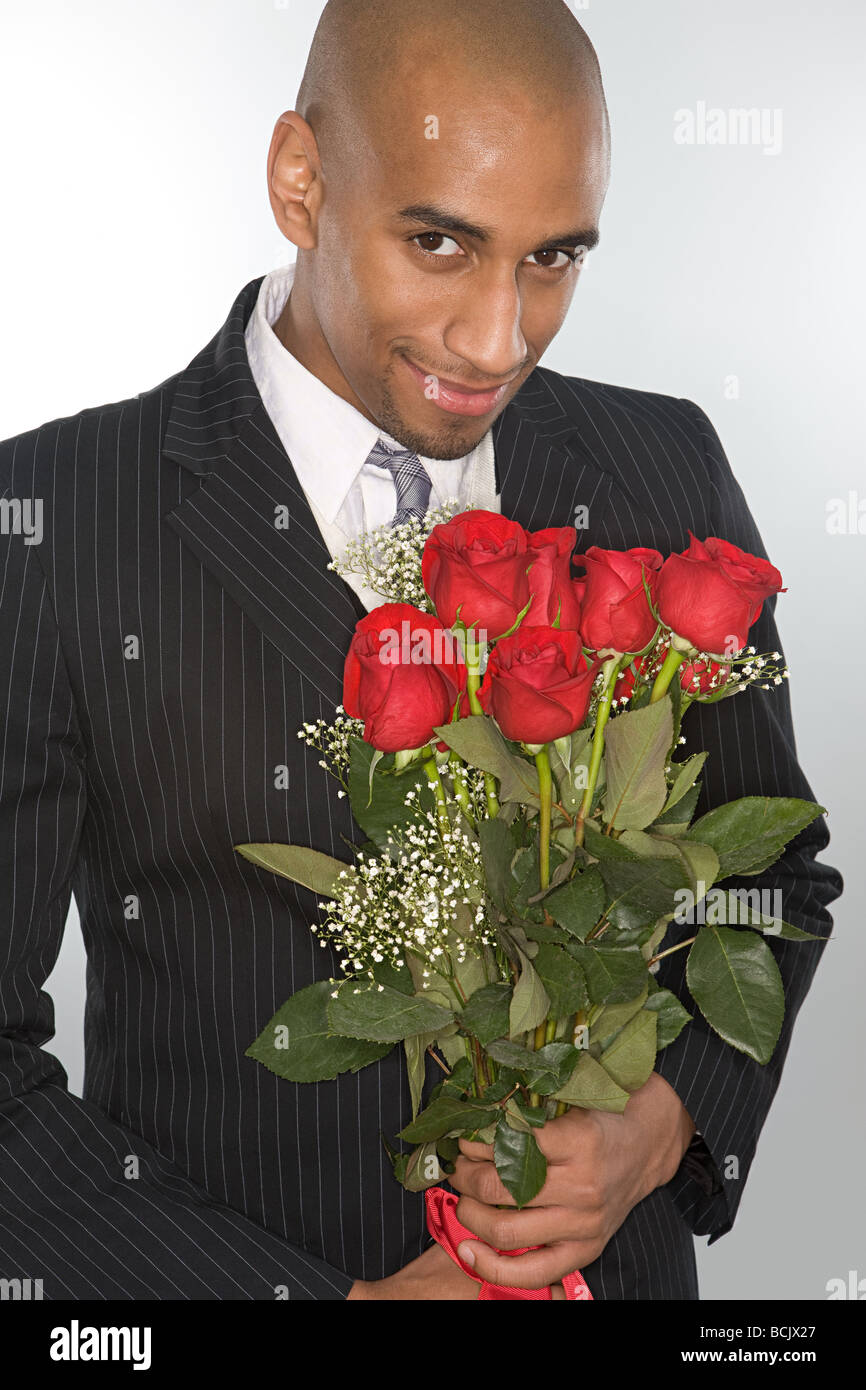 Man holding roses hi-res stock photography and images - Alamy