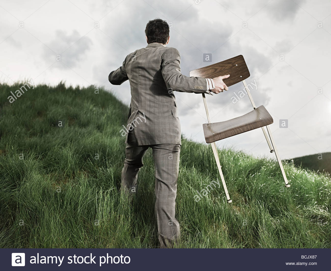 Carrying Chair Stock Photos & Carrying Chair Stock Images - Alamy