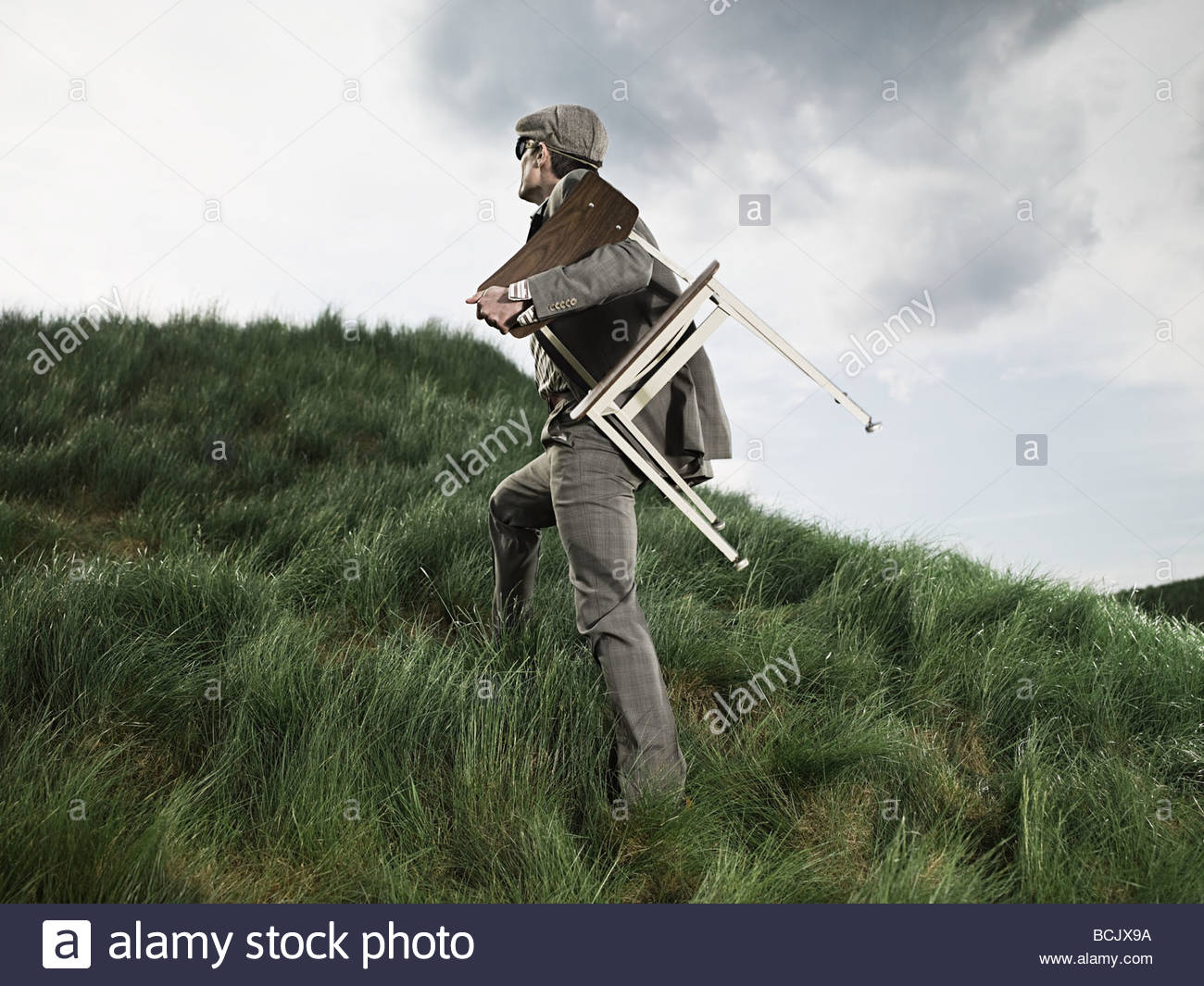 Carrying Chair Stock Photos & Carrying Chair Stock Images - Alamy