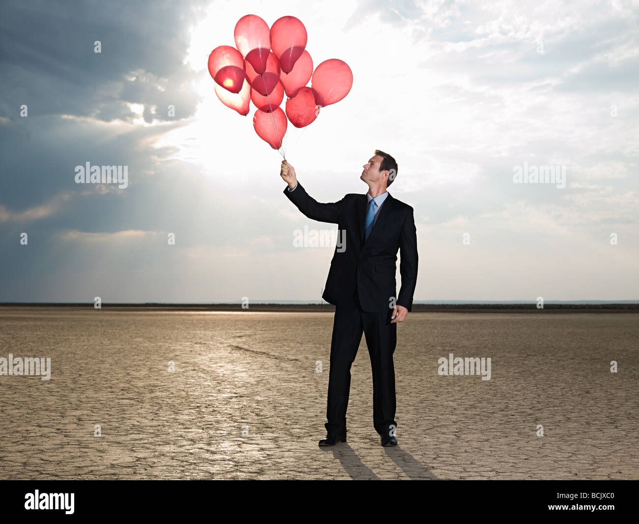 Red balloons hi-res stock photography and images - Alamy
