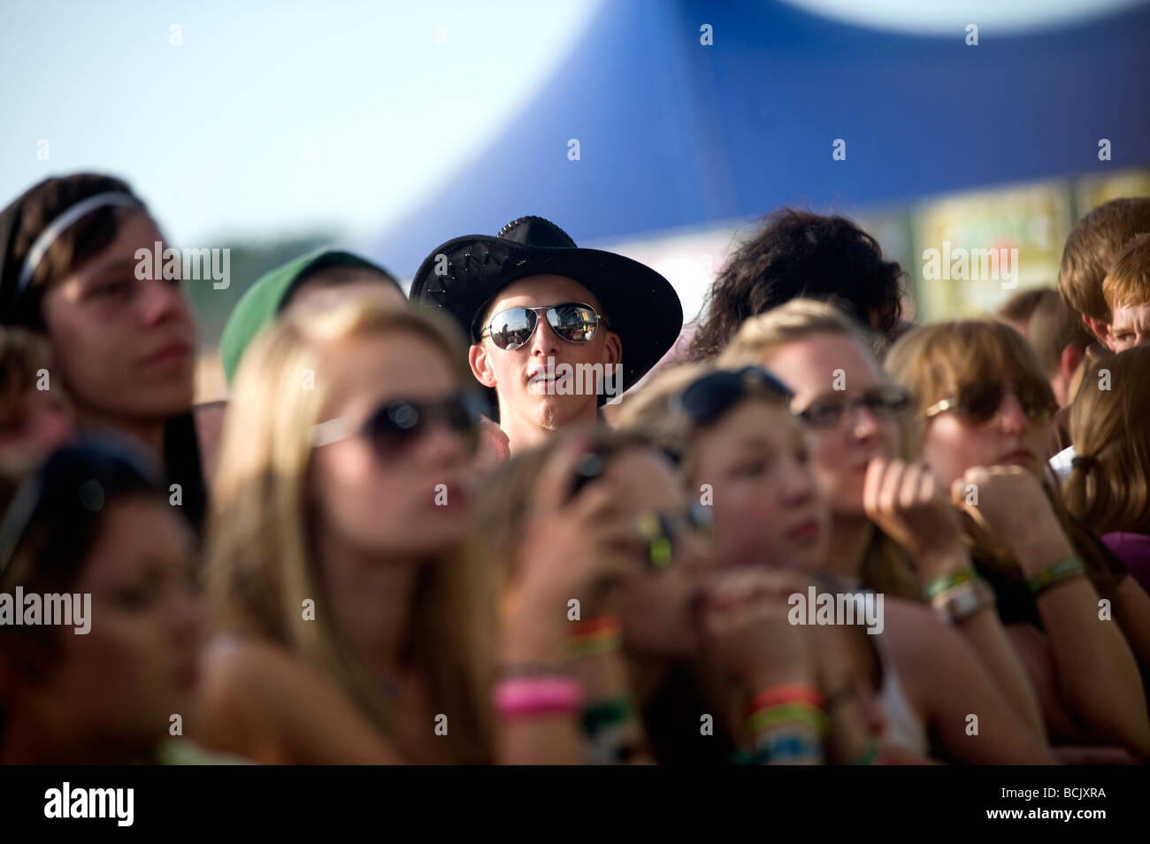 Fans at an outdoor music festival Stock Photo - Alamy