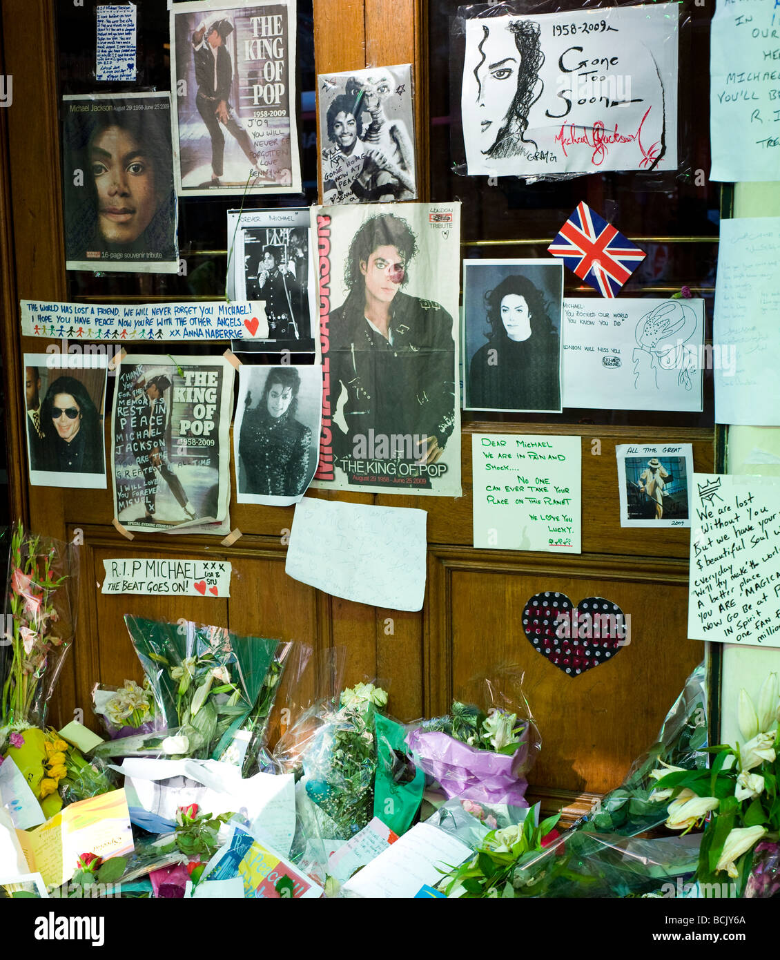 Flowers and tribute messages from Michael Jackson fans outside the ...