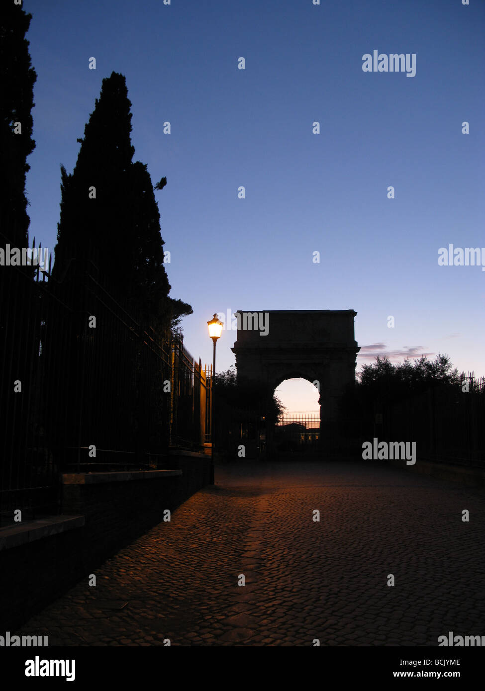 titus triumph victory arch in the roman forum illuminated at night ...