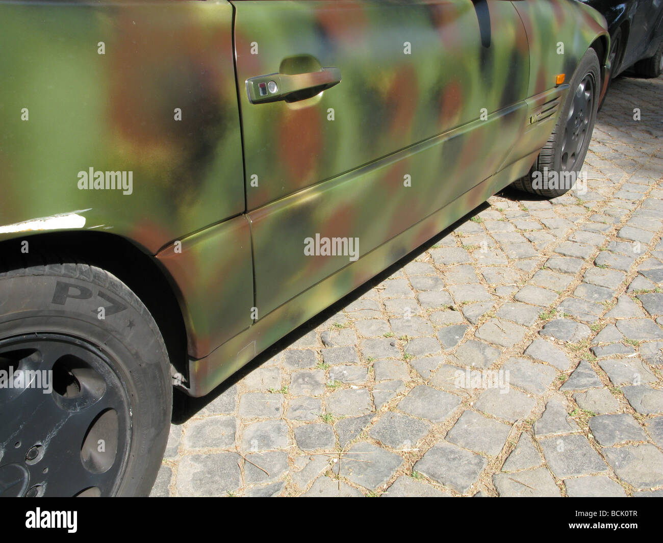 mercedes sports car painted with military army camouflage design Stock ...