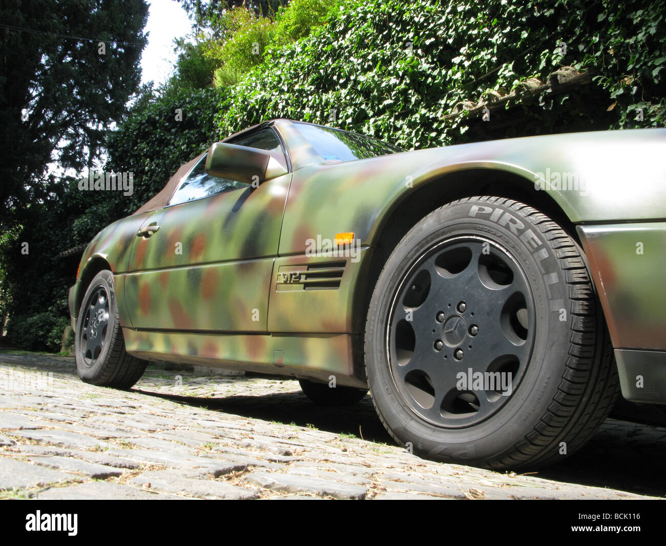 mercedes sports car painted with military army camouflage design Stock ...
