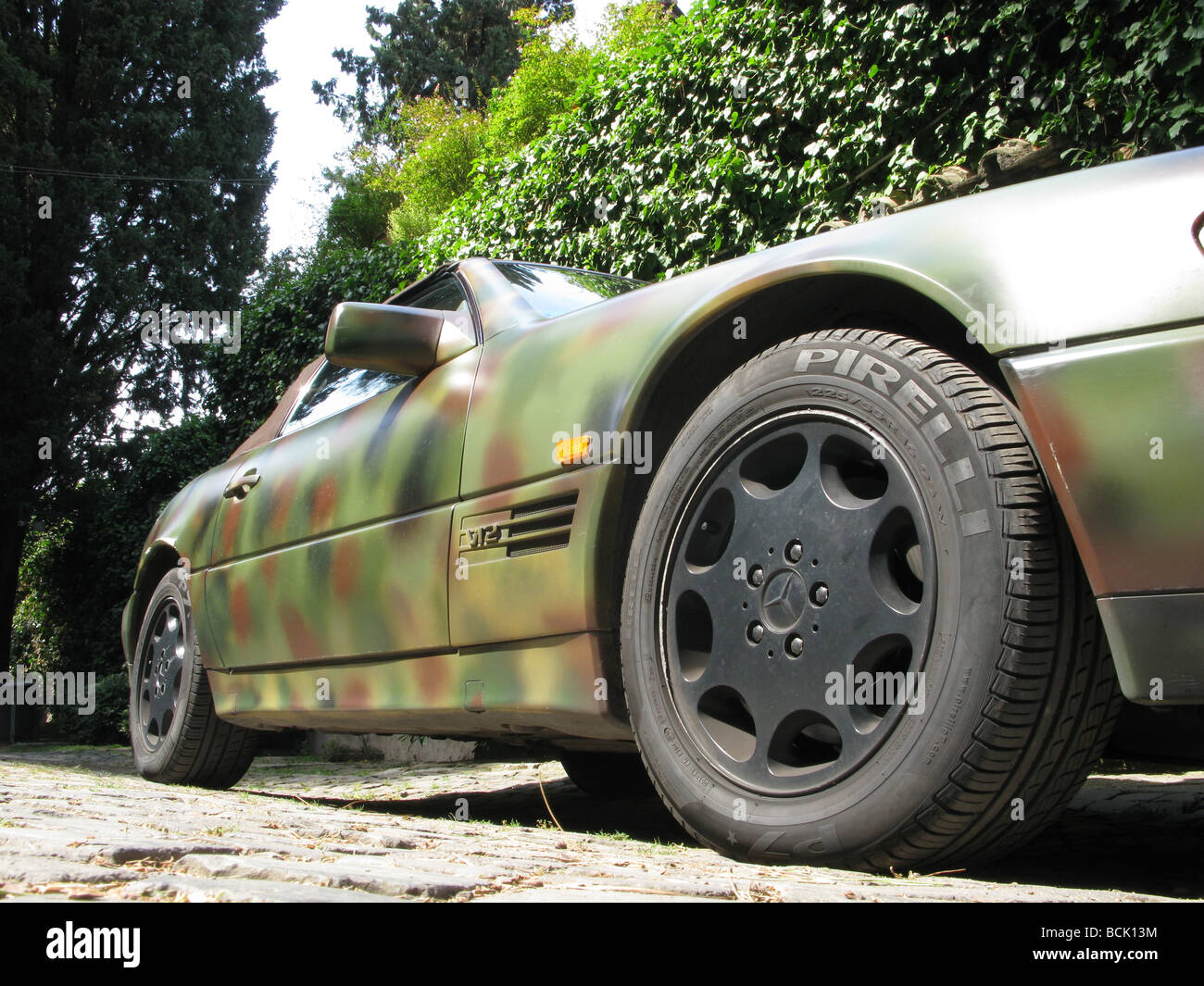mercedes sports car painted with military army camouflage design Stock ...