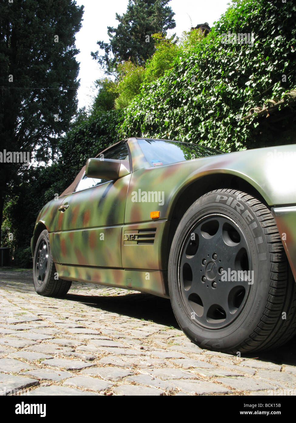 mercedes sports car painted with military army camouflage design Stock ...