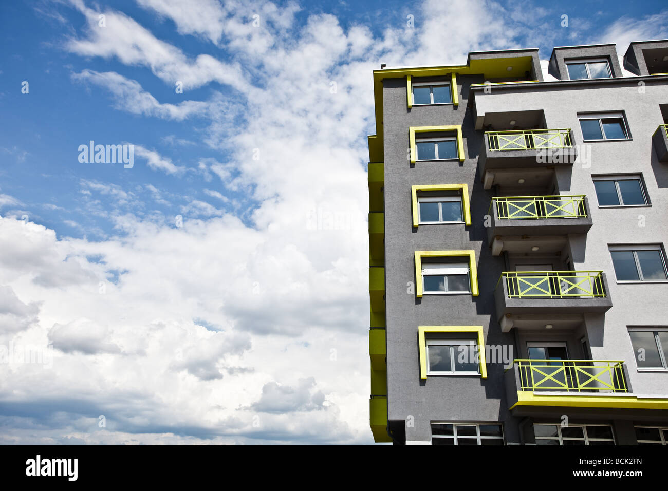 Generic building condo against blue sky Stock Photo - Alamy