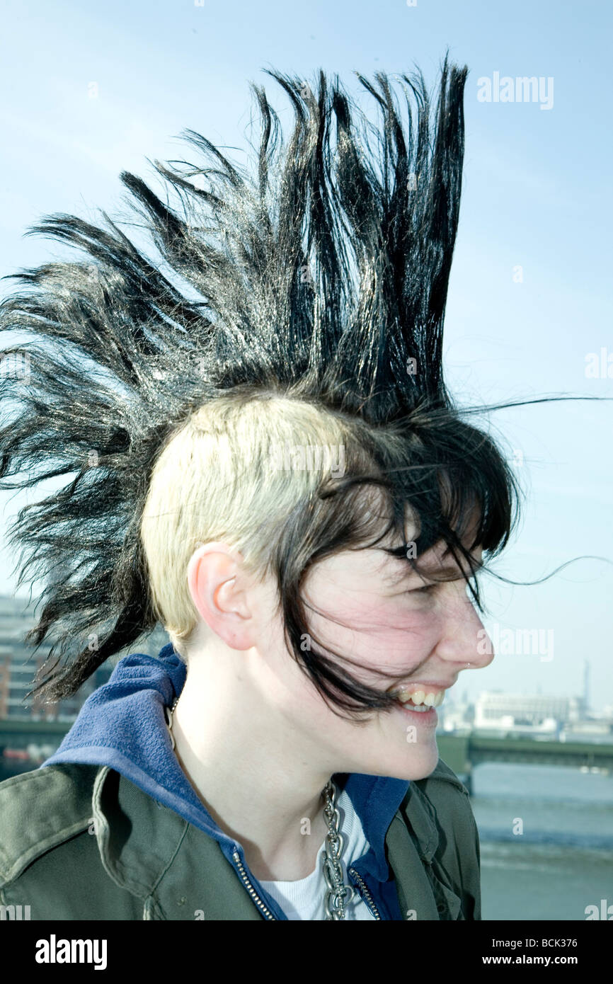 A punk girl 'Rae Ray Riots' with a large Mohican, London Bridge, London ...