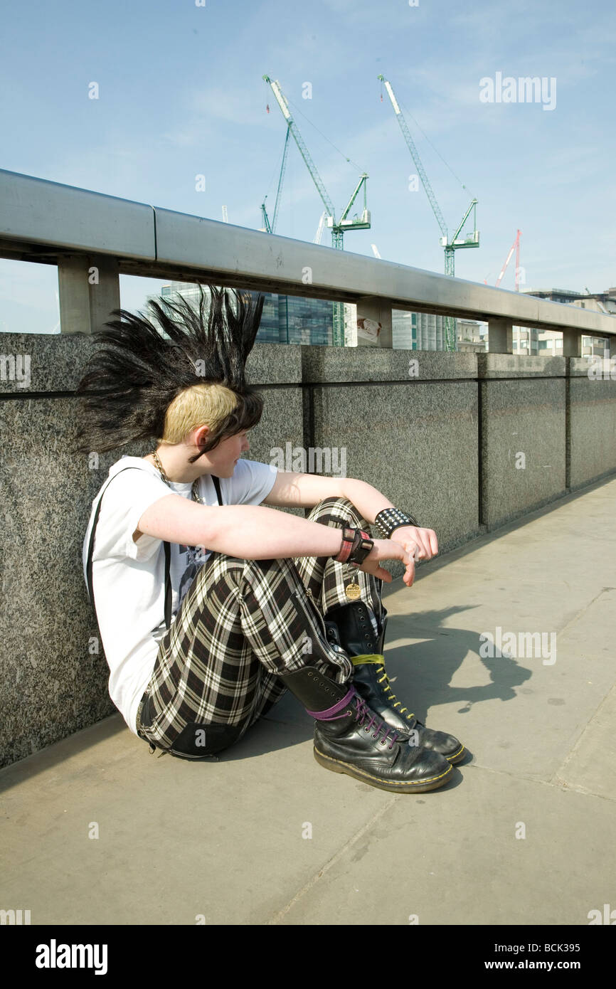 A punk girl 'Rae Ray Riots' with a large Mohican, London Bridge, London ...