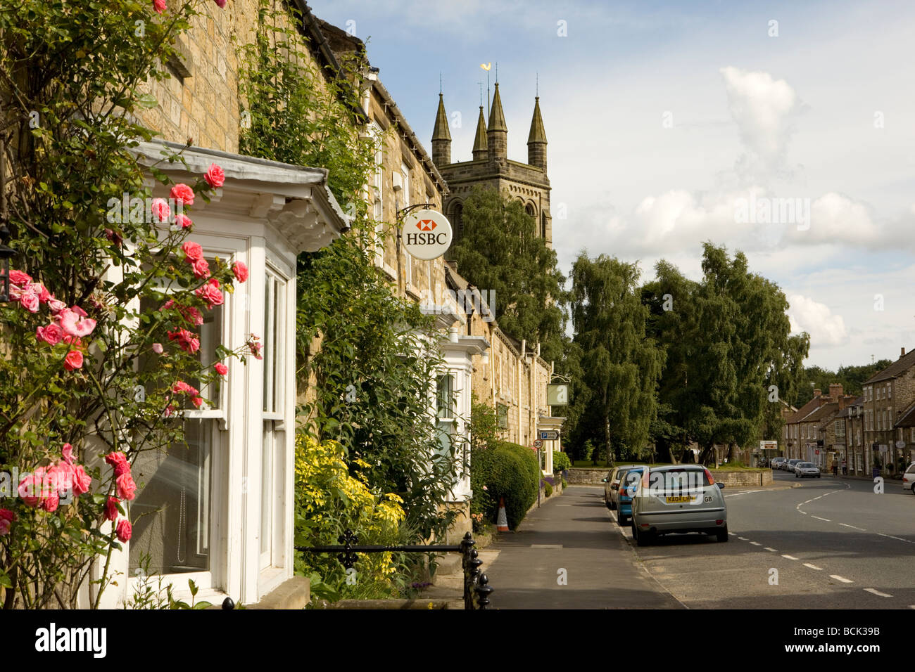 Summer flowers in the High Street in Helmsley, North Yorkshire Stock ...