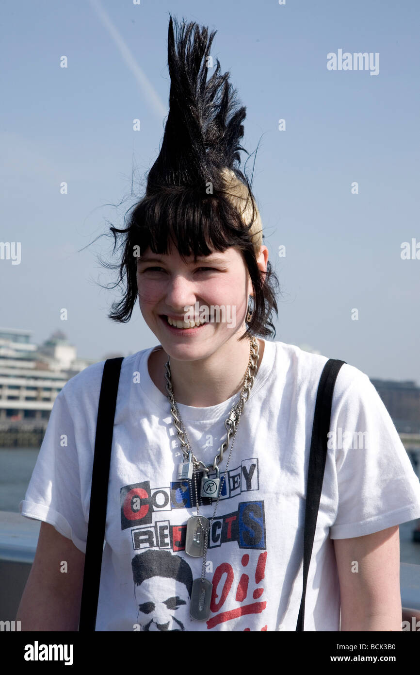 A punk girl 'Rae Ray Riots' with a large Mohican, London Bridge, London ...