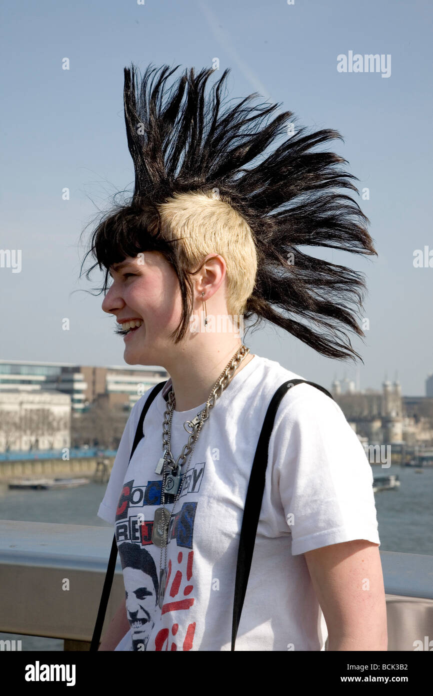 A punk girl 'Rae Ray Riots' with a large Mohican, London Bridge, London ...