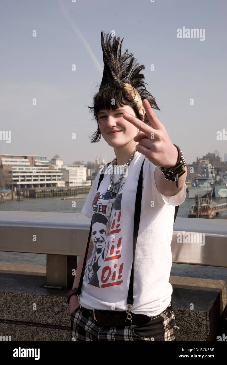 A punk girl 'Rae Ray Riots' with a large Mohican, London Bridge, London ...
