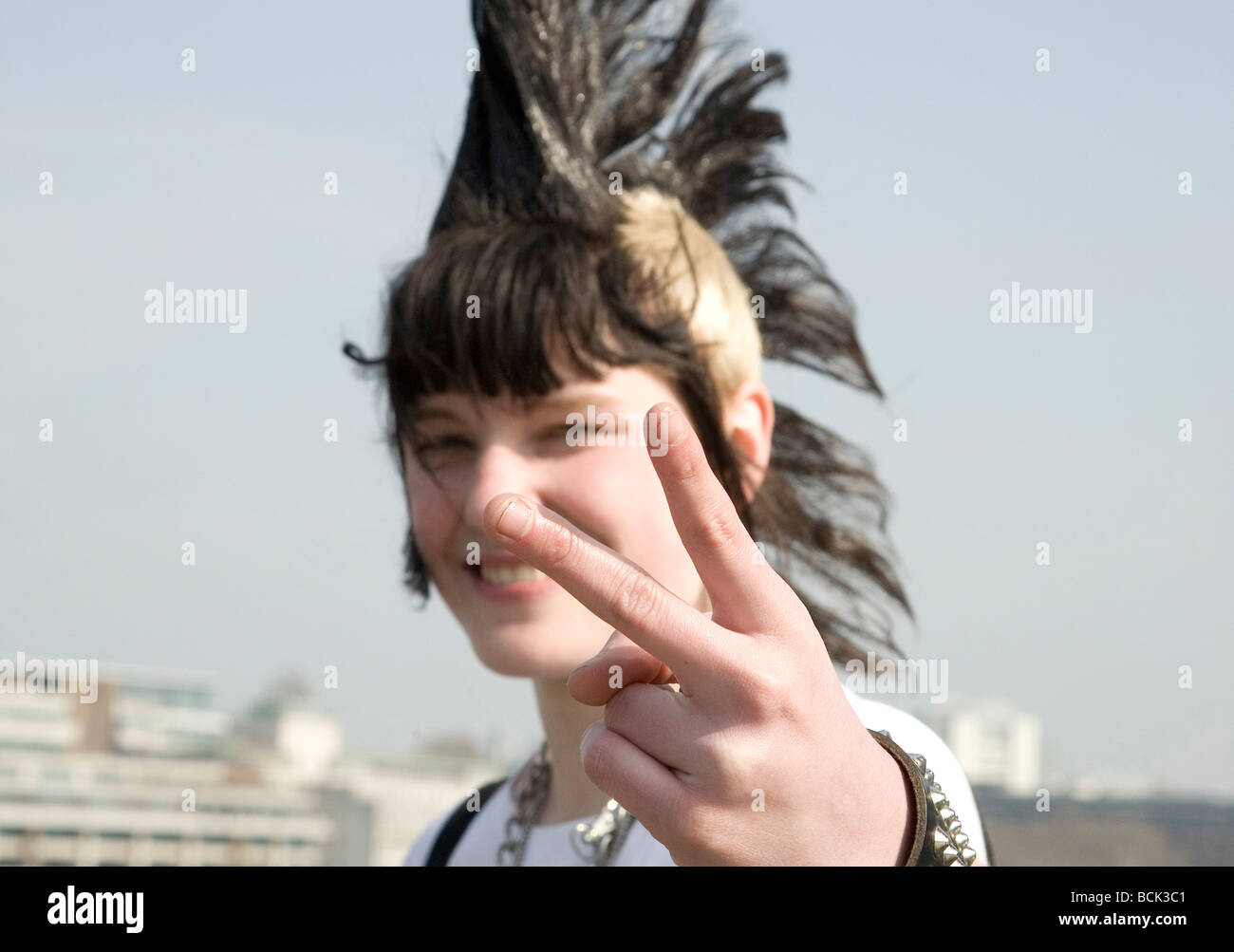 A punk girl 'Rae Ray Riots' with a large Mohican, London Bridge, London ...