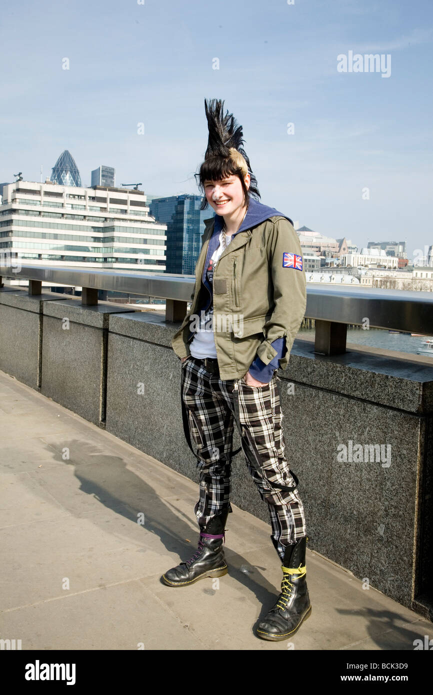 A punk girl 'Rae Ray Riots' with a large Mohican, London Bridge, London ...